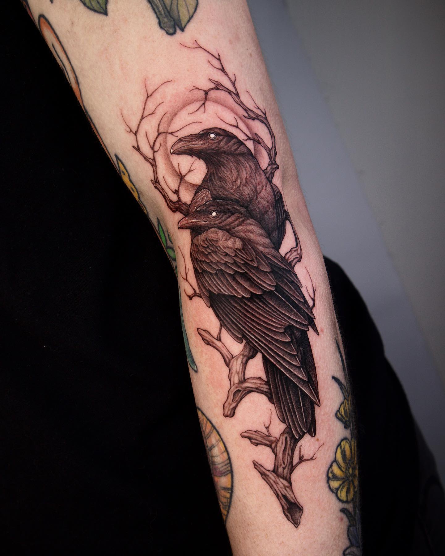 10 BEST RAVEN TATTOO IDEAS WE'VE SEEN IN 2024