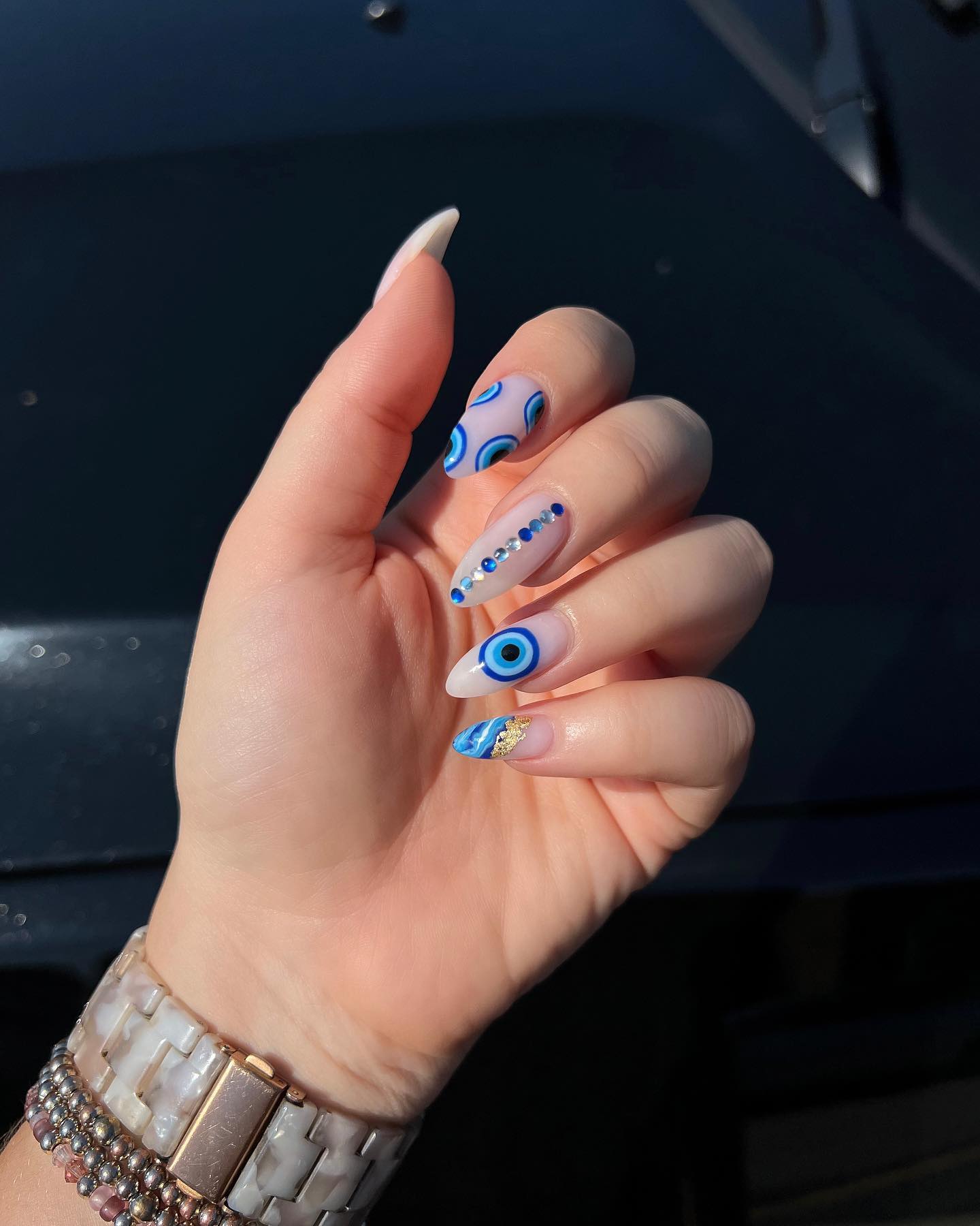 Channel Mystique with 20 Evil-Eye Nail Designs for 2024