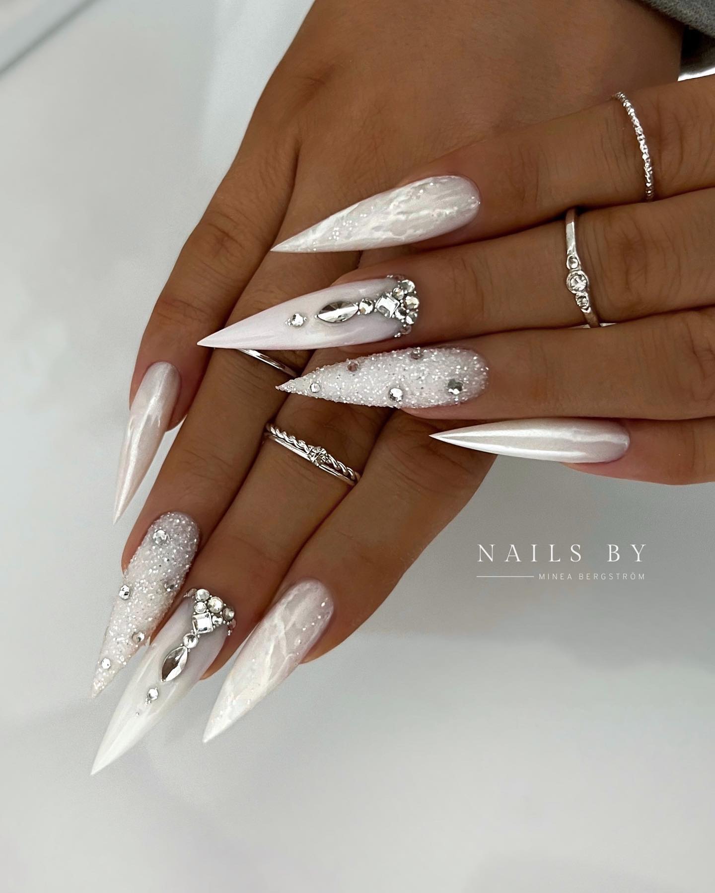 Get Festive with 20 Stiletto Christmas Nail Ideas in 2024