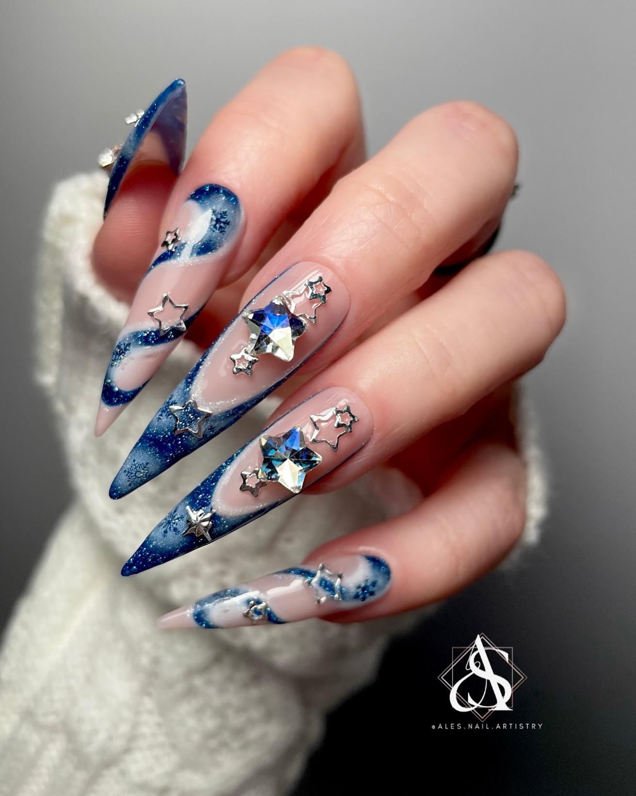 Get Festive with 20 Stiletto Christmas Nail Ideas in 2024